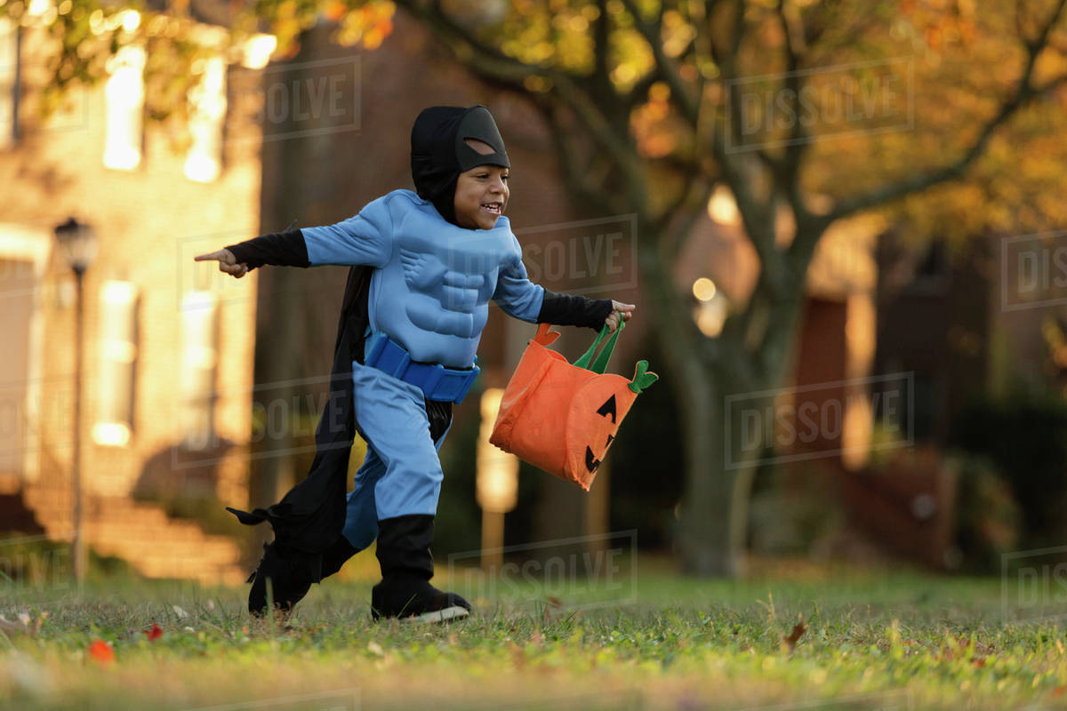 African American boy trick-or-treating on Halloween - Royalty-free ...