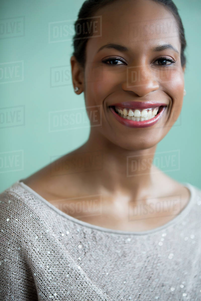Close up of woman's smiling face - Royalty-free Stock Photo | Dissolve