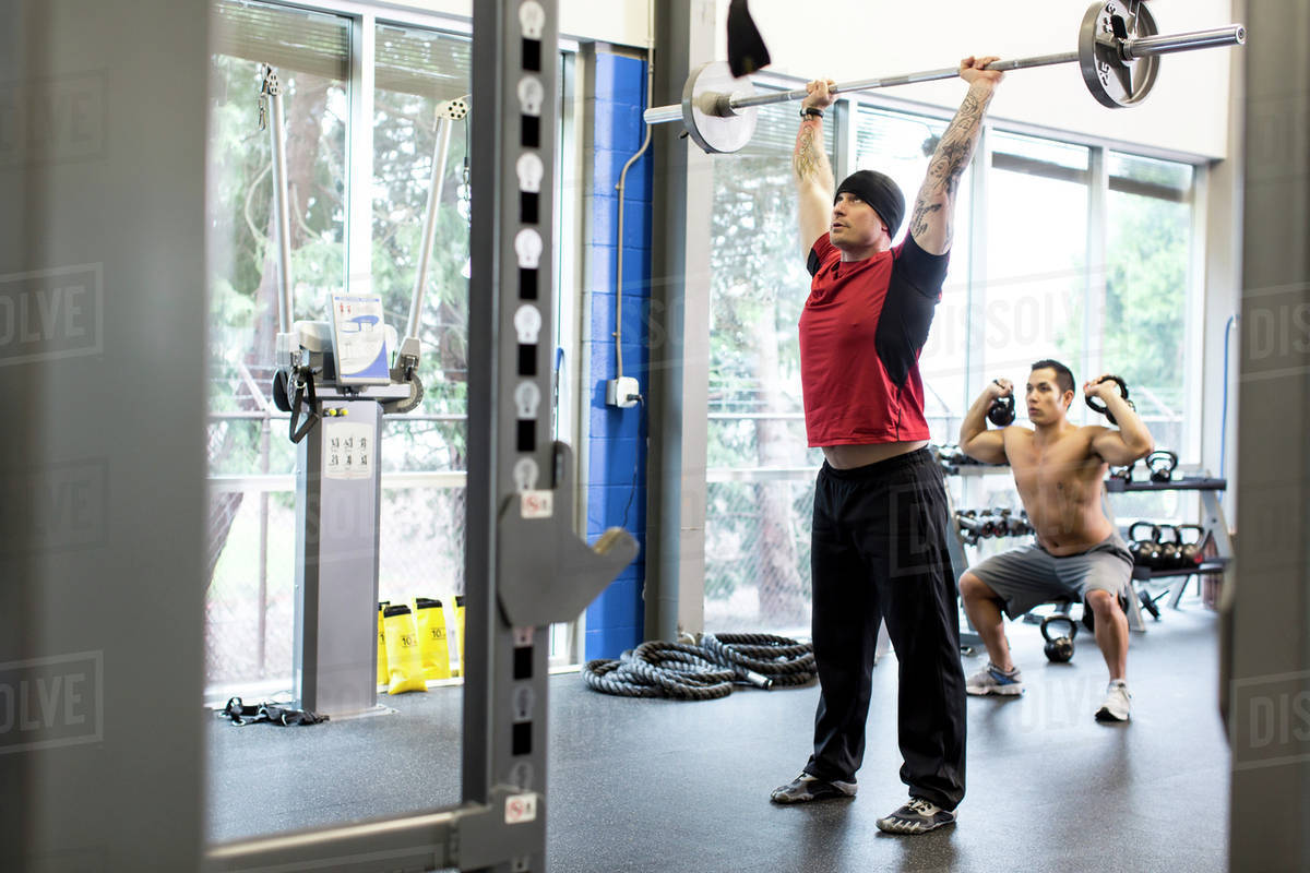 Men working out in gym - Royalty-free Stock Photo | Dissolve