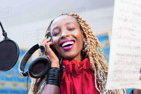 African American singer recording in studio - Royalty-free Stock Photo ...