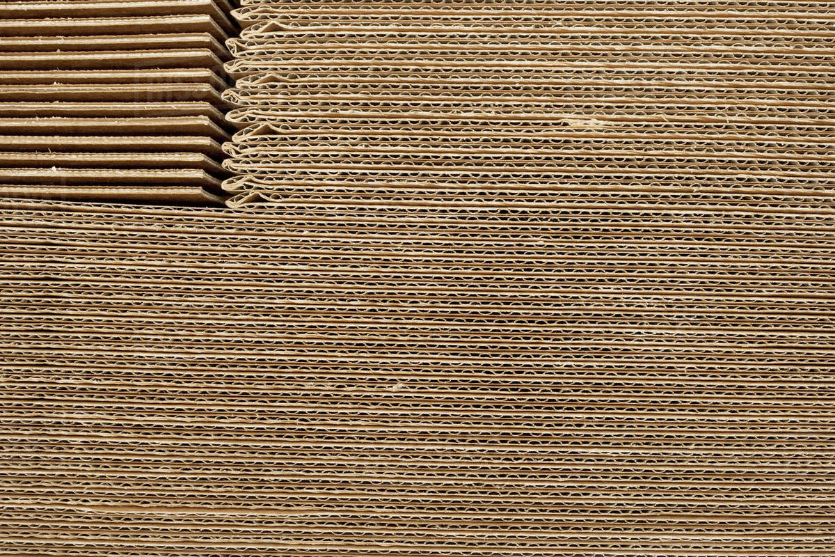 Stack of Flattened Boxes - Stock Photo - Dissolve