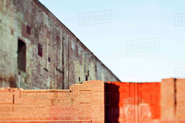 Partial Brick Wall and Doors - Stock Photo - Dissolve