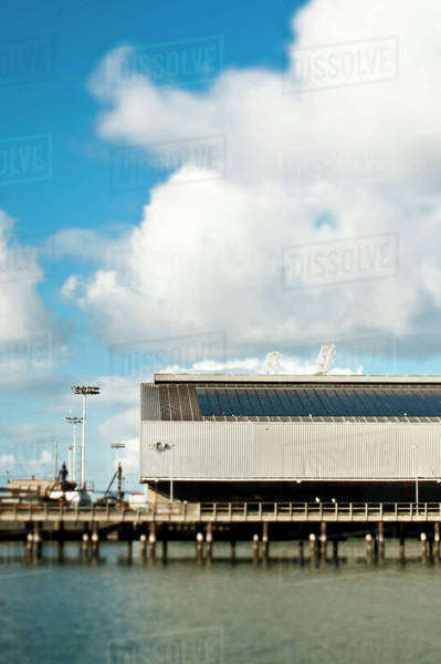 Warehouse and Cranes At a Seaport - Royalty-free Stock Photo | Dissolve