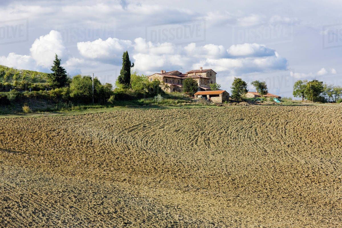 Farmhouse and Field - Royalty-free Stock Photo | Dissolve