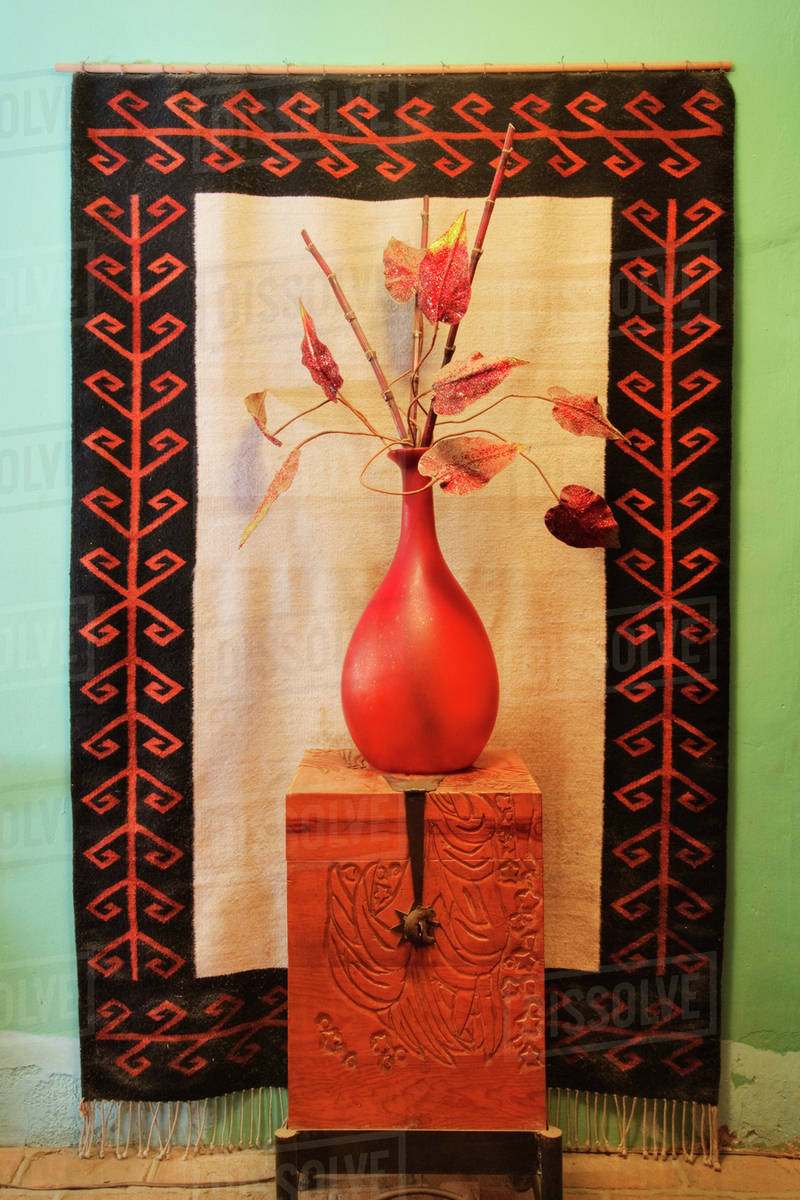 Decorative Vase on a Wooden Chest - Royalty-free Stock Photo | Dissolve