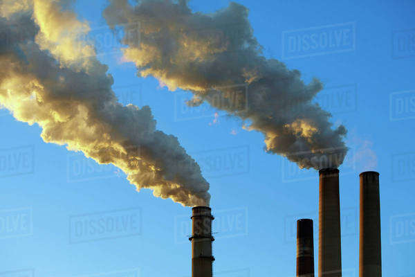Smoke emitting from factory smoke stacks - Royalty-free Stock Photo ...