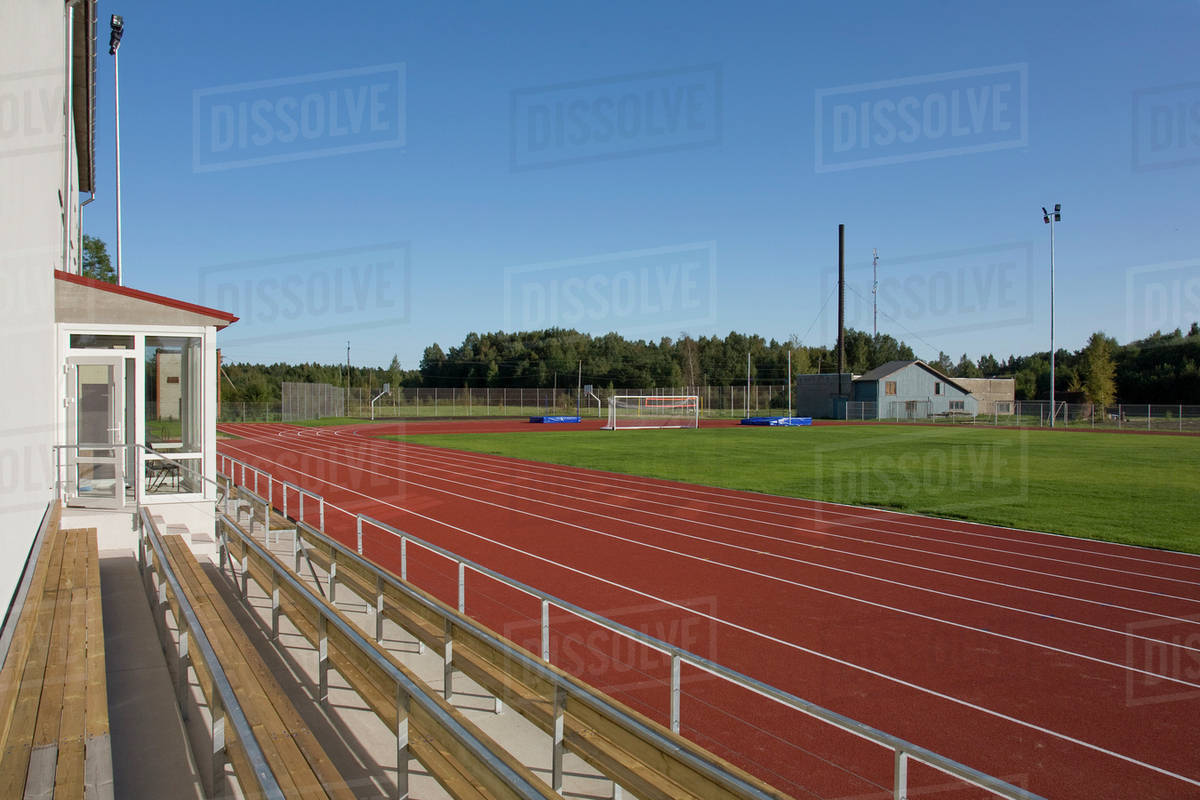 Bleachers at a Running Track - Stock Photo - Dissolve