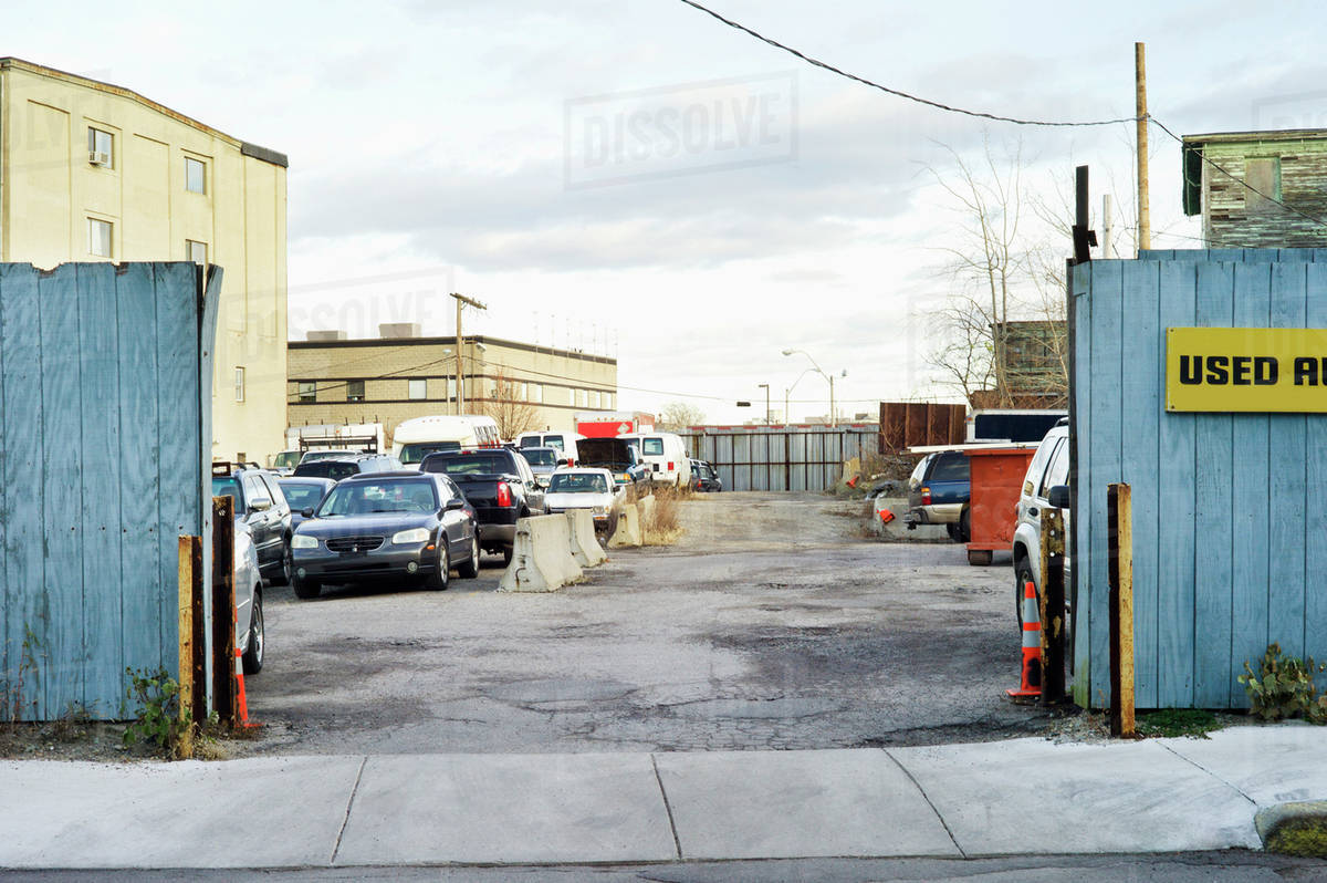 Cars parked in urban lot - Royalty-free Stock Photo | Dissolve