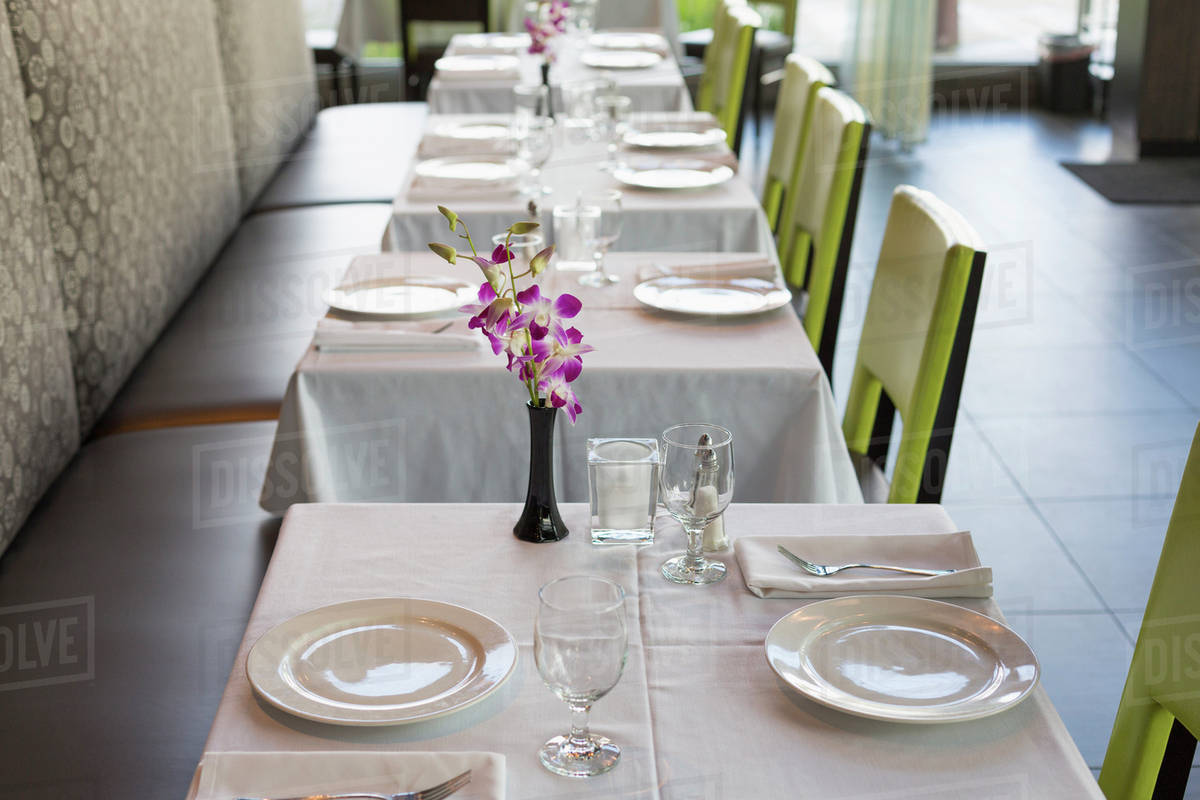 Set tables in Thai restaurant - Royalty-free Stock Photo | Dissolve