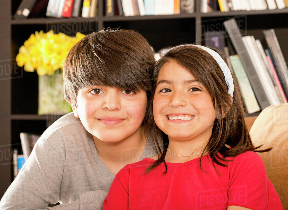 Smiling Hispanic brother and sister - Royalty-free Stock Photo | Dissolve