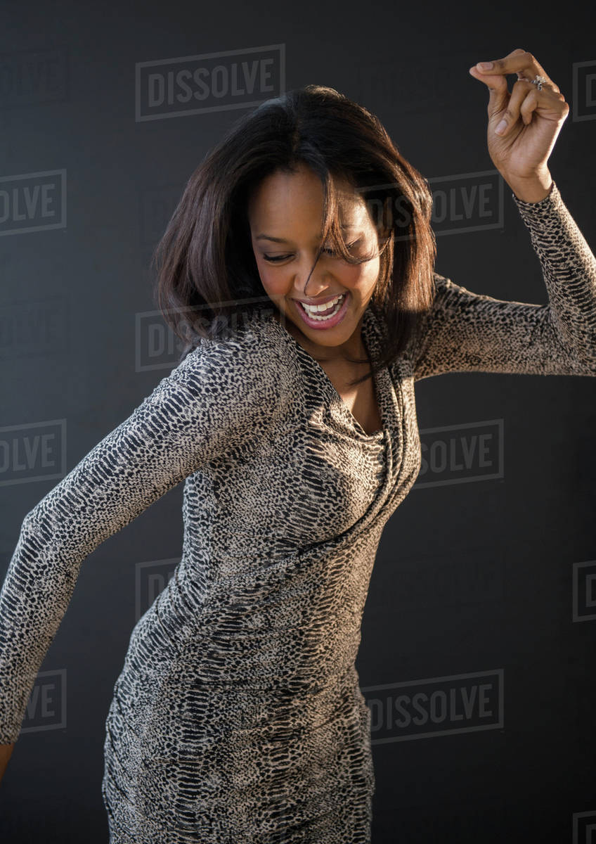 African American woman dancing - Royalty-free Stock Photo | Dissolve