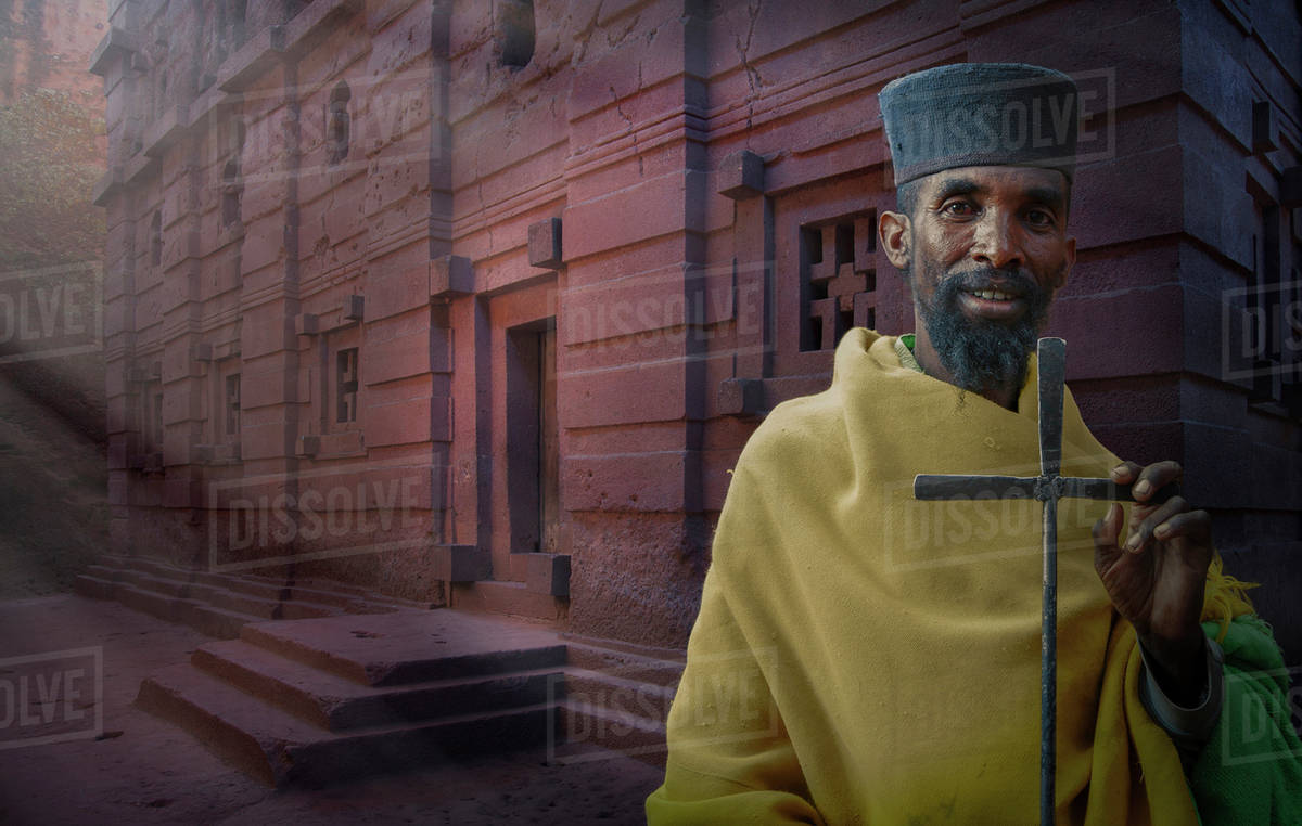 Black priest carrying cross in Lalibela, Ethiopia - Royalty-free Stock ...