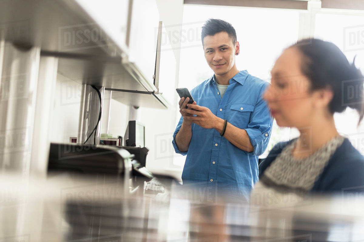 Business people using technology in office - Royalty-free Stock Photo ...