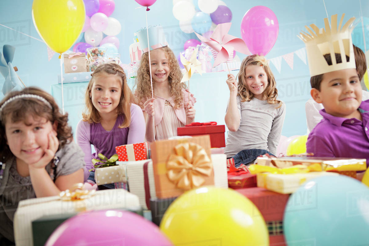 Children smiling at birthday party - Royalty-free Stock Photo | Dissolve
