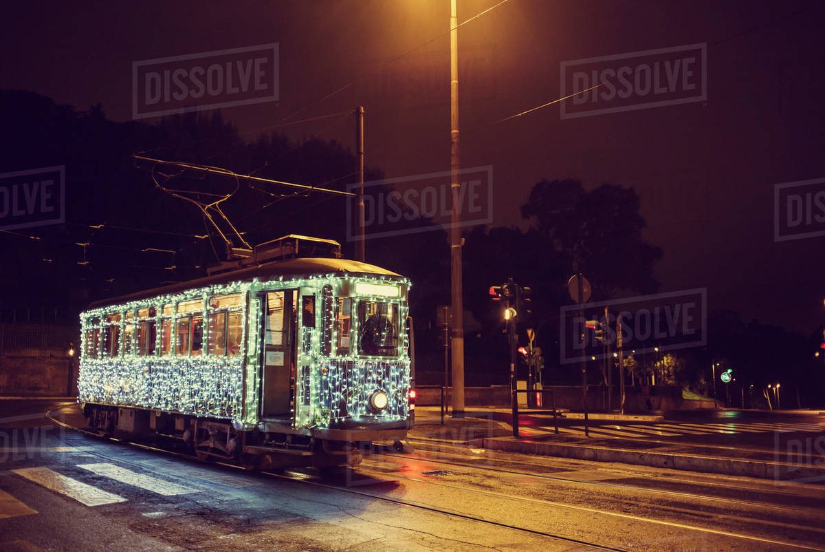 Illuminated streetcar on city street, Rome, Italy - Royalty-free Stock ...