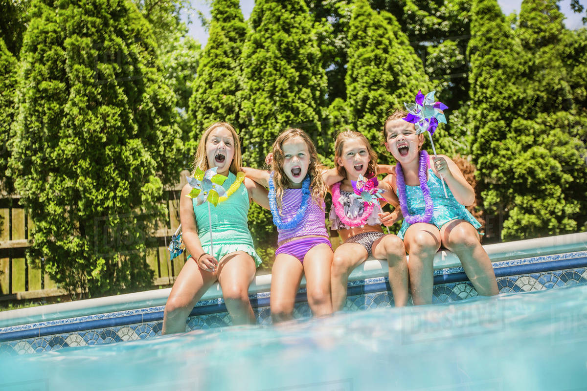 Caucasian girls cheering at swimming pool - Royalty-free Stock Photo ...