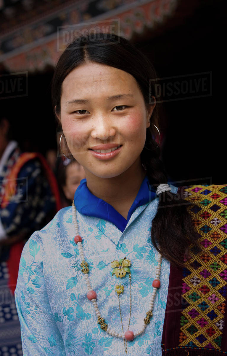 Smiling Asian girl wearing traditional clothing - Royalty-free Stock ...