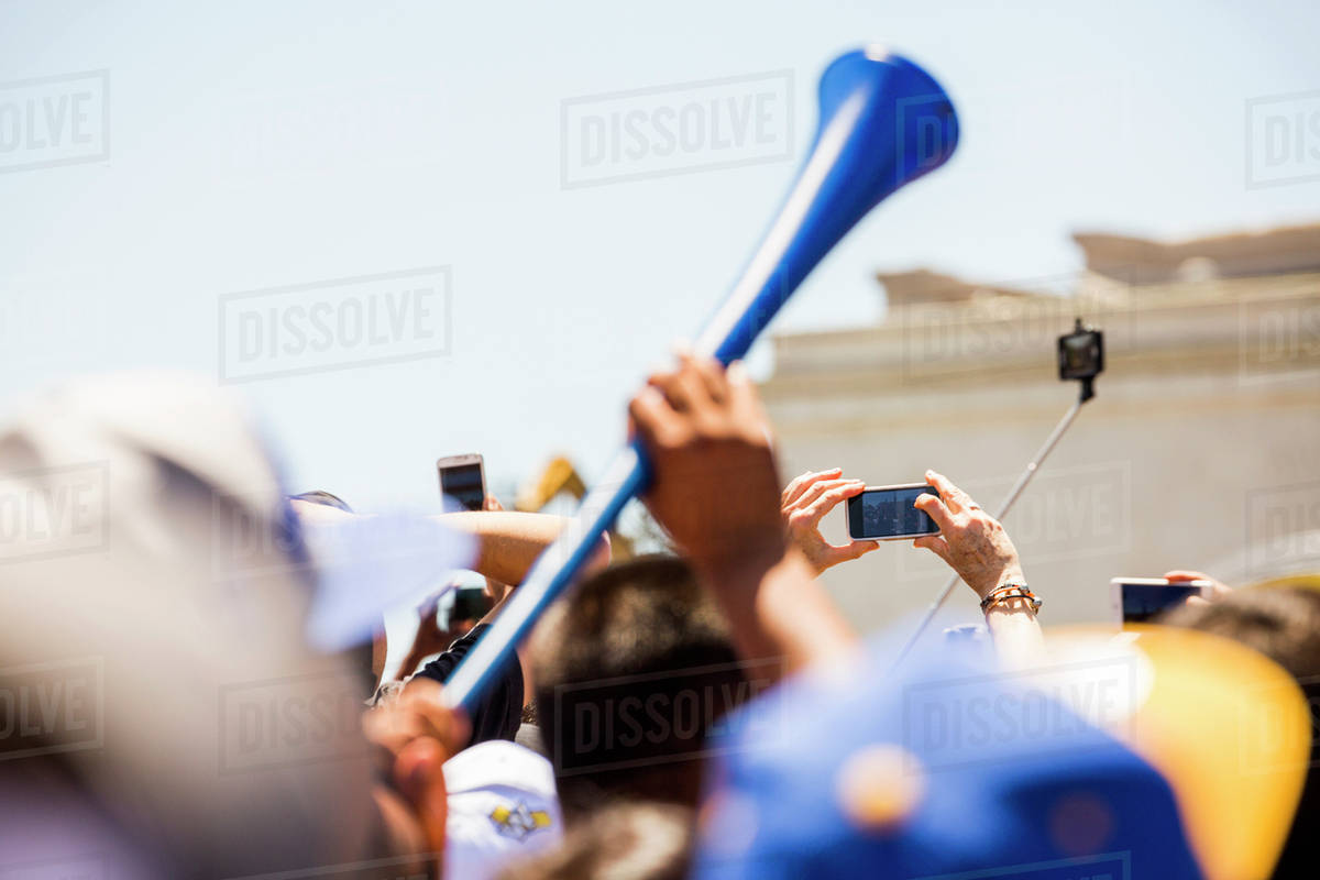Crowd of fans cheering at sporting event - Royalty-free Stock Photo ...
