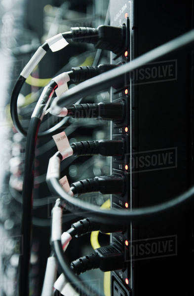 Close up of computer cords - Stock Photo - Dissolve