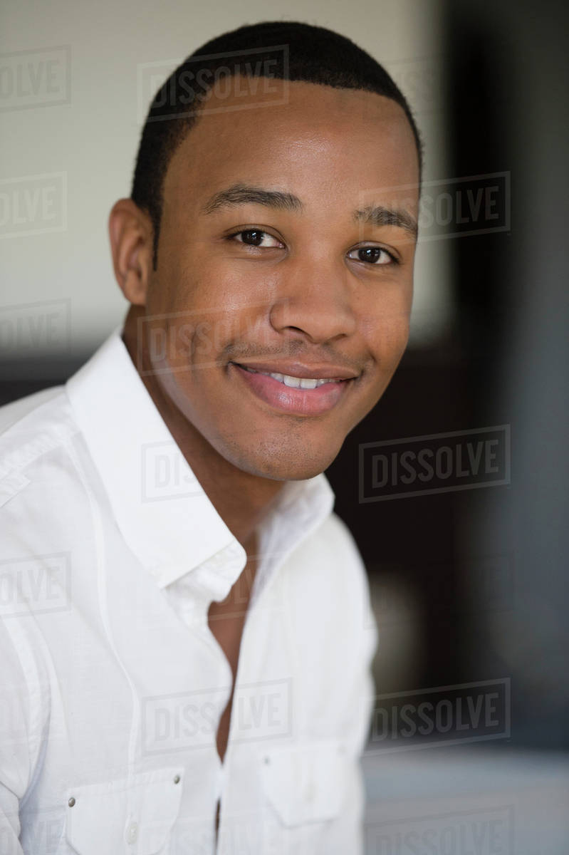 Smiling mixed race man - Royalty-free Stock Photo | Dissolve