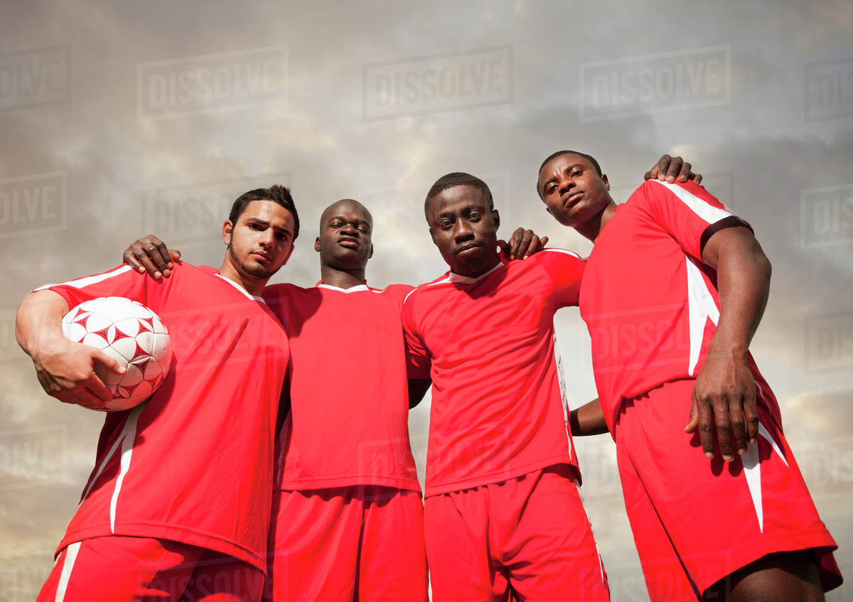 Soccer players standing together - Stock Photo - Dissolve