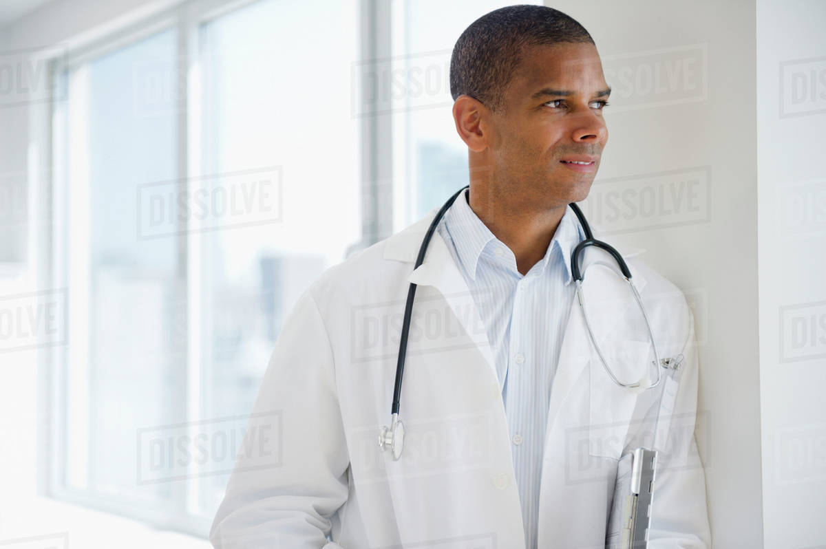 Serious mixed race doctor - Royalty-free Stock Photo | Dissolve