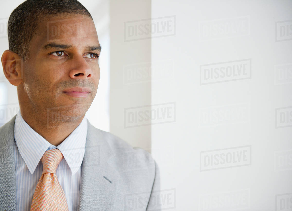 Serious mixed race businessman - Royalty-free Stock Photo | Dissolve