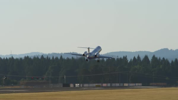 Commuter plane taking off - Stock Video Footage - Dissolve