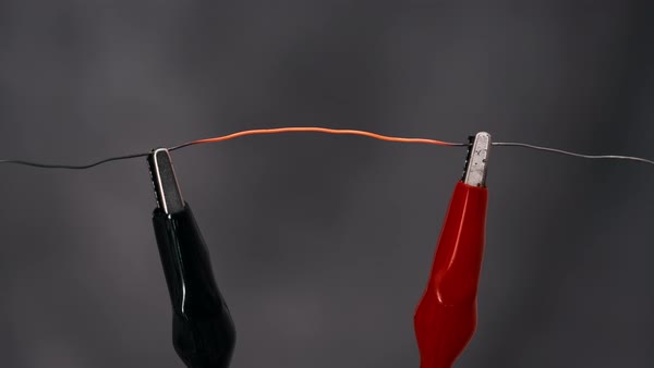 Nichrome wire heated to red under high current strength. Nichrome ...