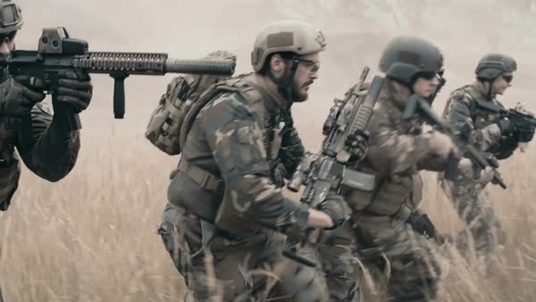 Slow motion of armed soldiers running forward to attack - HD Royalty ...