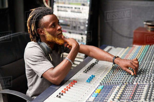 Handsome sound operator working in audio studio - Royalty-free Stock ...