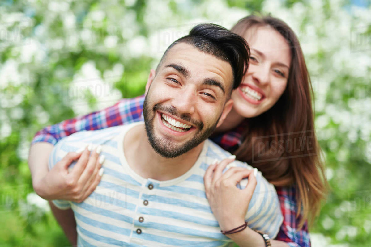Cheerful dates looking at camera with smiles - Royalty-free Stock Photo ...