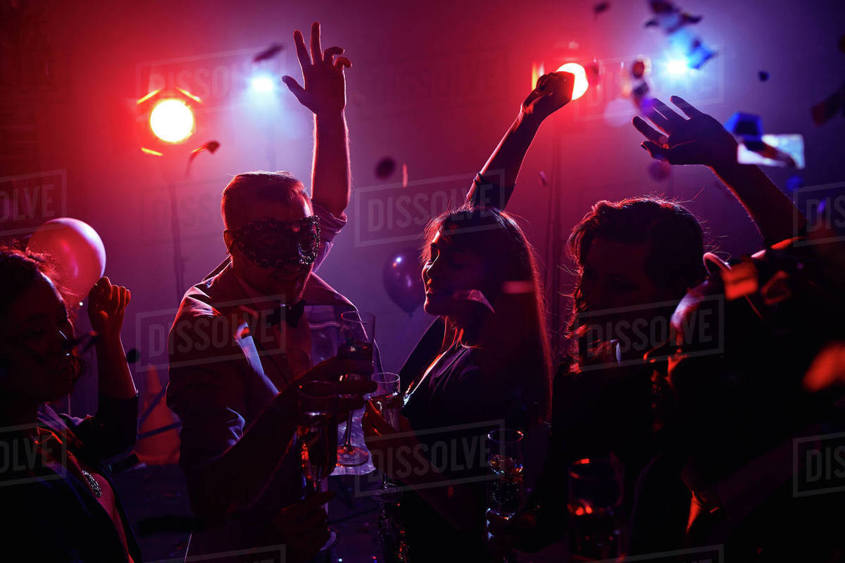 Group of friends enjoying a cool party - Stock Photo - Dissolve