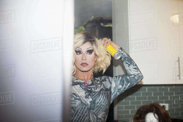 Drag queen spraying hairspray - Royalty-free Stock Photo | Dissolve