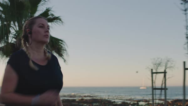 Overweight woman runner overtaking in competition running marathon ...