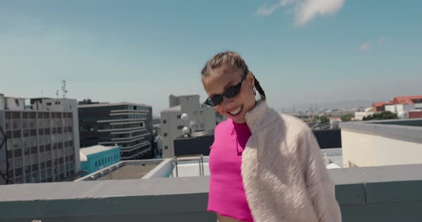 Woman dancing on roof top girl performing hip hop dance style having ...