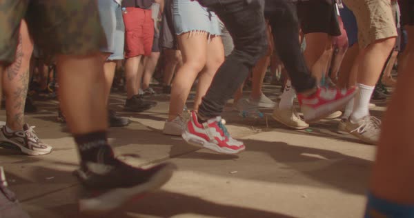 Jumping and foot dancing on the dance floor. Skanking is a form of ...