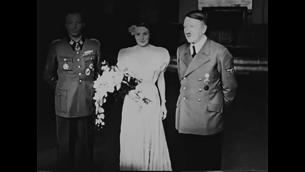 World War Two. Adolf Hitler stand beside the bridal pair on the wedding ...