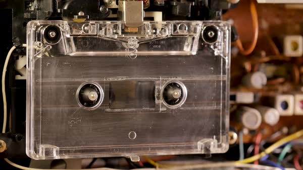 Cassette Tape playing in open tape recorder - 4K Royalty-free Stock ...