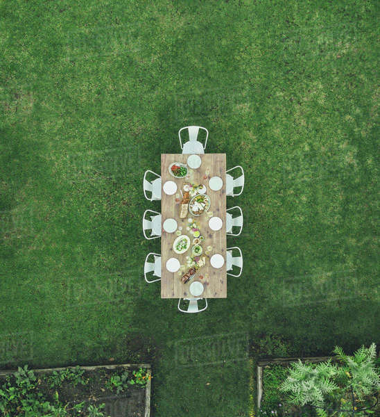 Aerial view of table setting outdoors in garden restaurant. Table ready ...