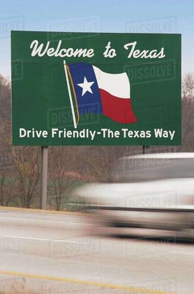 Car driving past Welcome to Texas sign at national border, Texas, USA ...