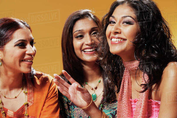 Portrait of three women smiling - Royalty-free Stock Photo | Dissolve