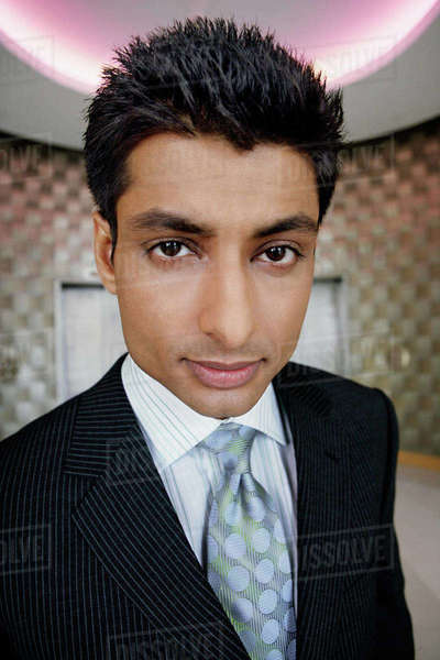 Indian businessman in office lobby - Royalty-free Stock Photo | Dissolve