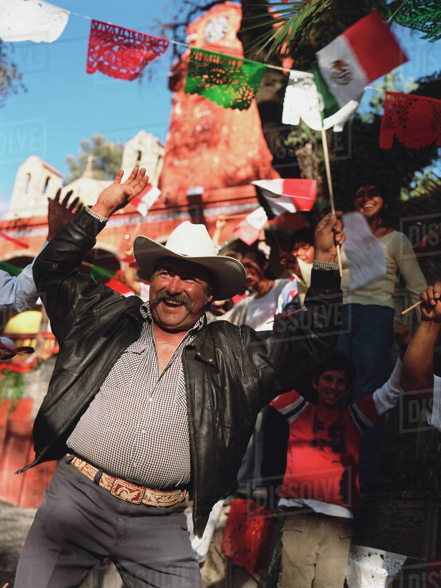 Man cheering at celebration - Royalty-free Stock Photo | Dissolve