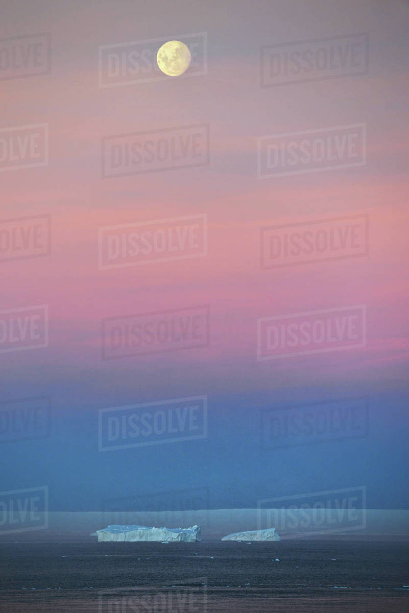 Iceberg and full moon rise in Antarctica - Royalty-free Stock Photo ...