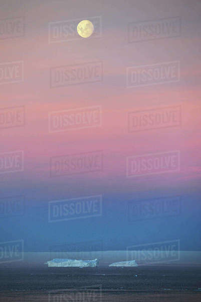 Iceberg and full moon rise in Antarctica - Royalty-free Stock Photo ...
