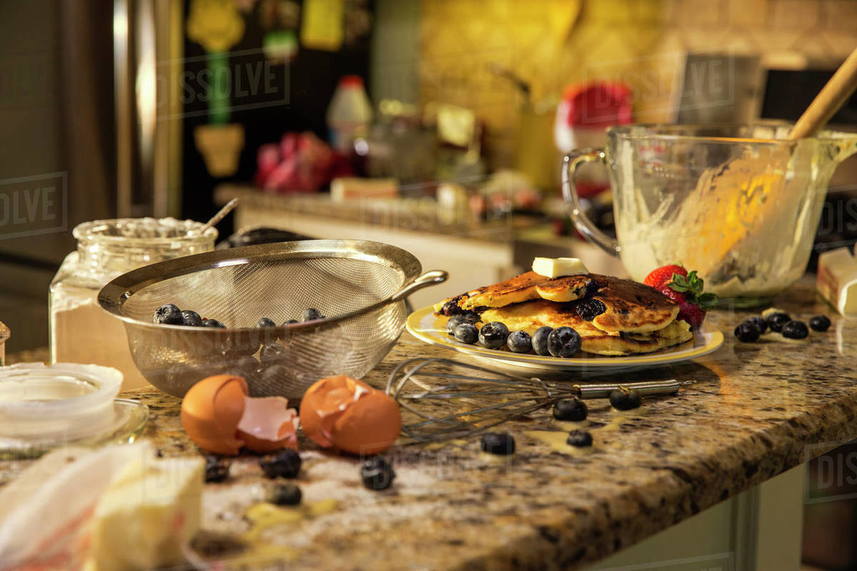 Messy kitchen counter after making blueberry pancakes - Royalty-free ...