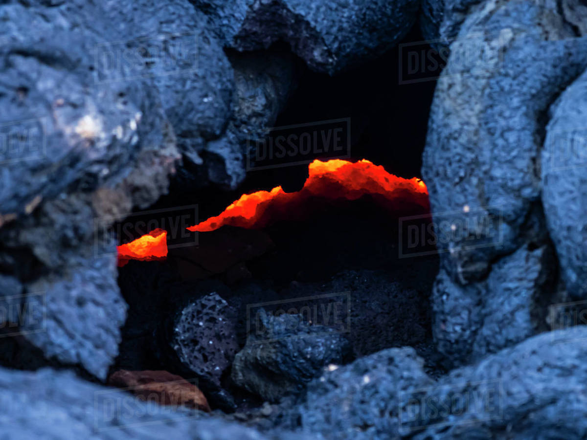 Hot magma visible underneath cooled lava crust, Fagradalsfjall volcano ...