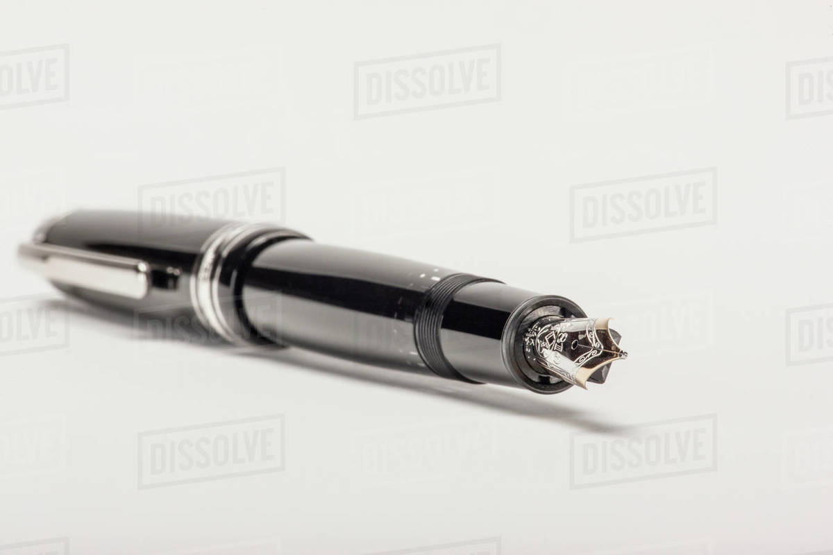 Close up shot of a modern dip pen, with point facing camera - Royalty ...