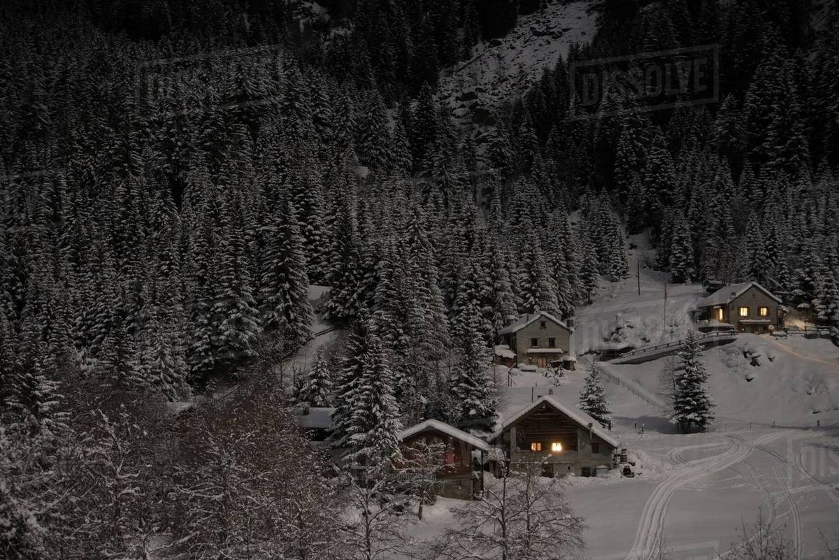 Alpine Village with Houses in Winter Landscape with Trees and Mountain ...